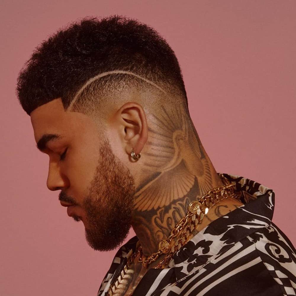 25 Men's Curly Hair Fade Haircuts That Look Slick & Modern