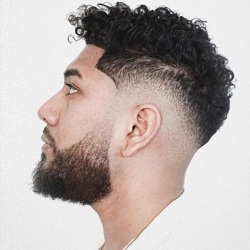 25 Men's Curly Hair Fade Haircuts That Look Slick & Modern