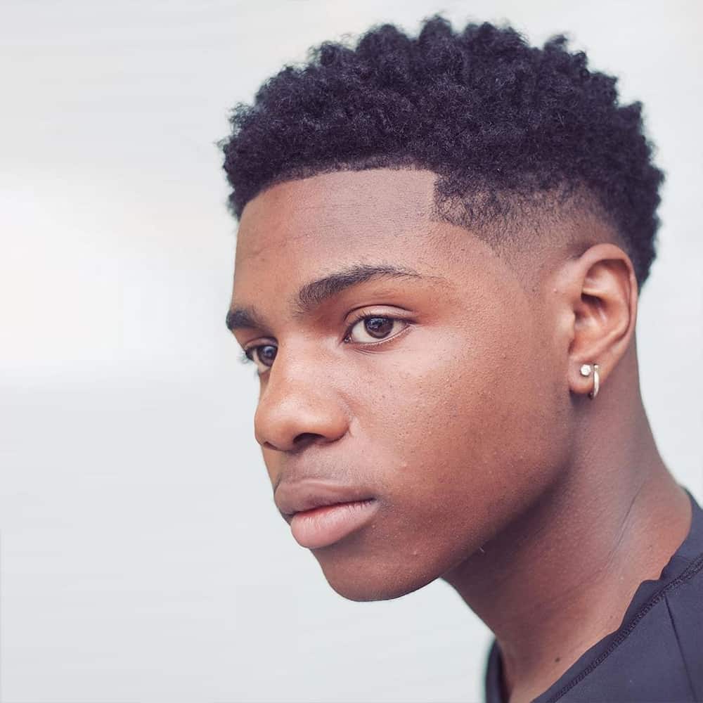 25 Men's Curly Hair Fade Haircuts That Look Slick & Modern